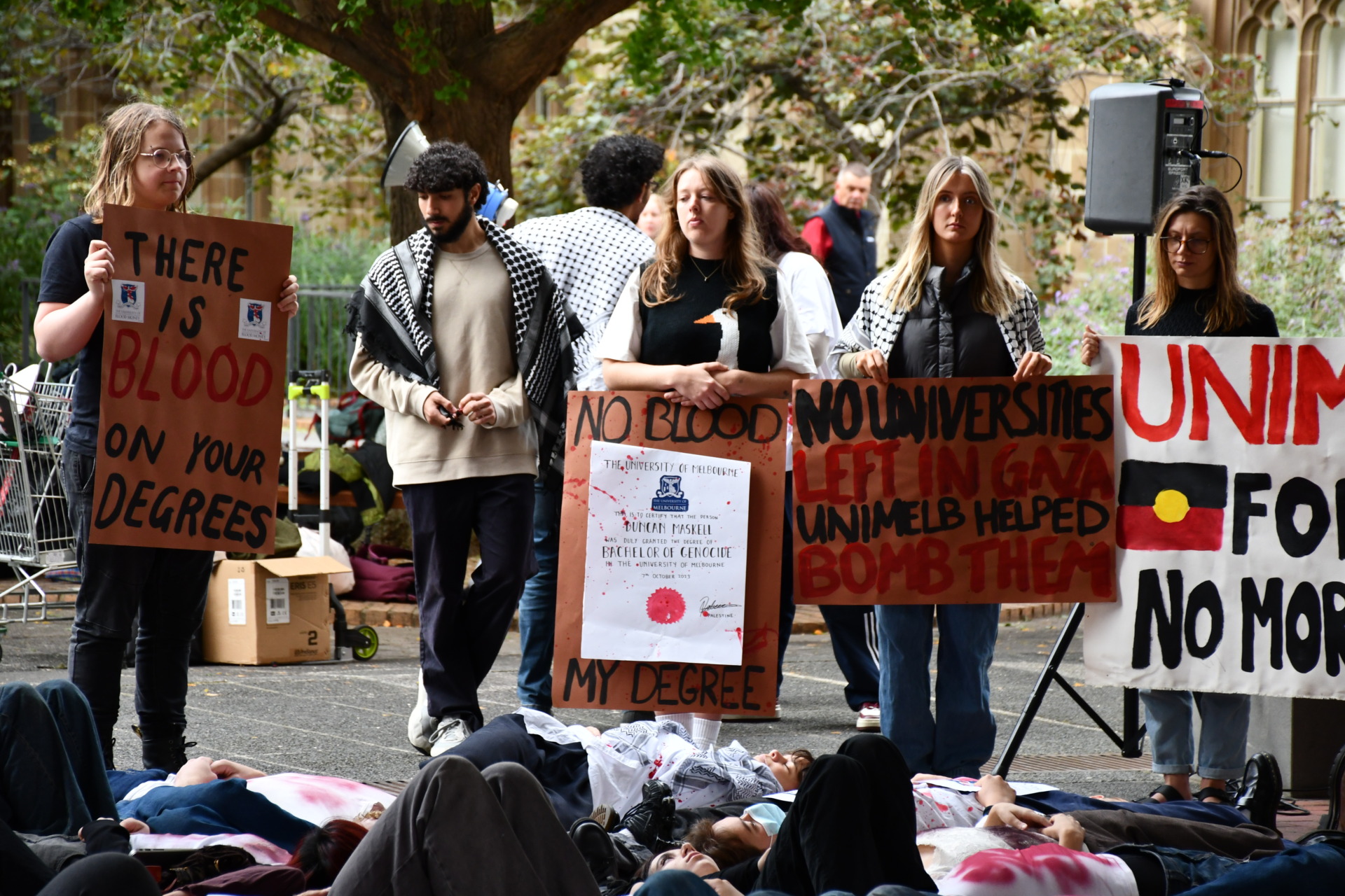 Gaza activists 'die-in' to demand uni cut ties to weapons makers –The Citizen